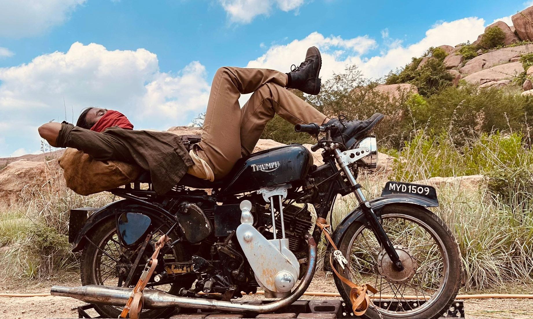 Captain Miller: Dhanush Strikes a Stylish Pose on Bike Teasing Fans for ...