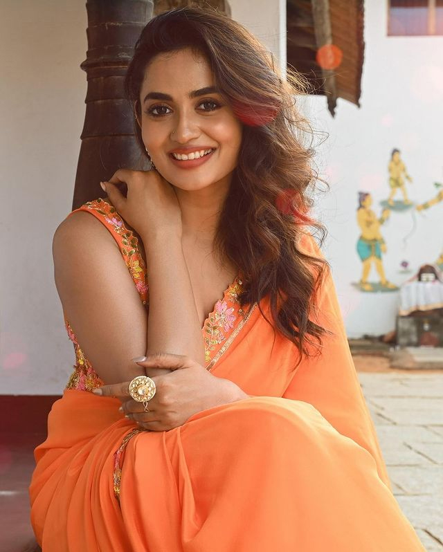 Teju Ashwini: Mesmerizing Elegance in Orange Saree | Teju Ashwini ...