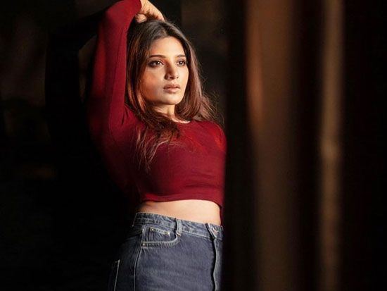 Aathmika Beautiful Poses in Red Top