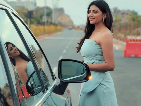 Lahari Shari Stylish Poses On Car