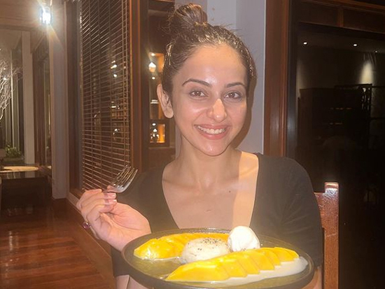 Casual Pics Of Rakul Eating Mango Rice