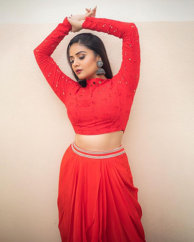 Ravishing Poses Of Sreemukhi In Red Outfit