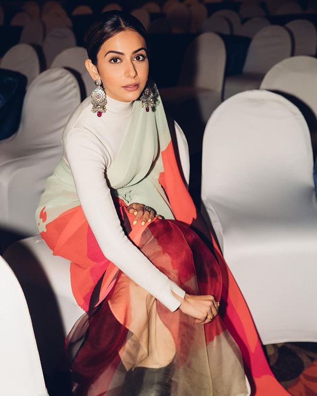 Staggering Poses Of Rakul Singh In Orange