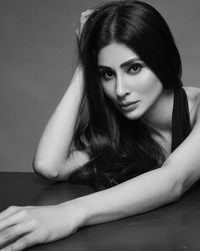 Titillating Poses From Mouni Roy In Swimwear